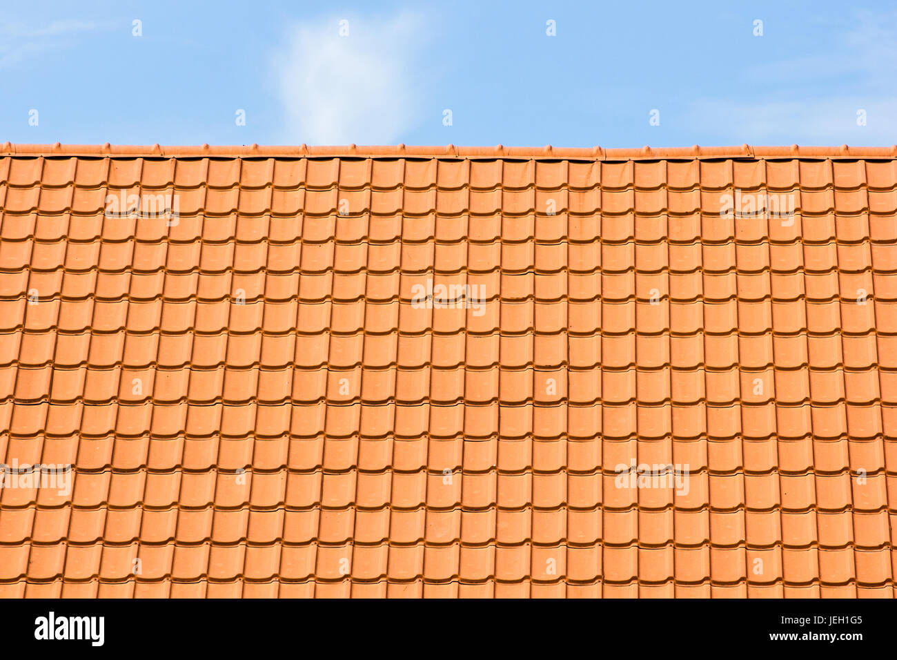 Tile-roofed house.architecture, attic, background Stock Photo - Alamy