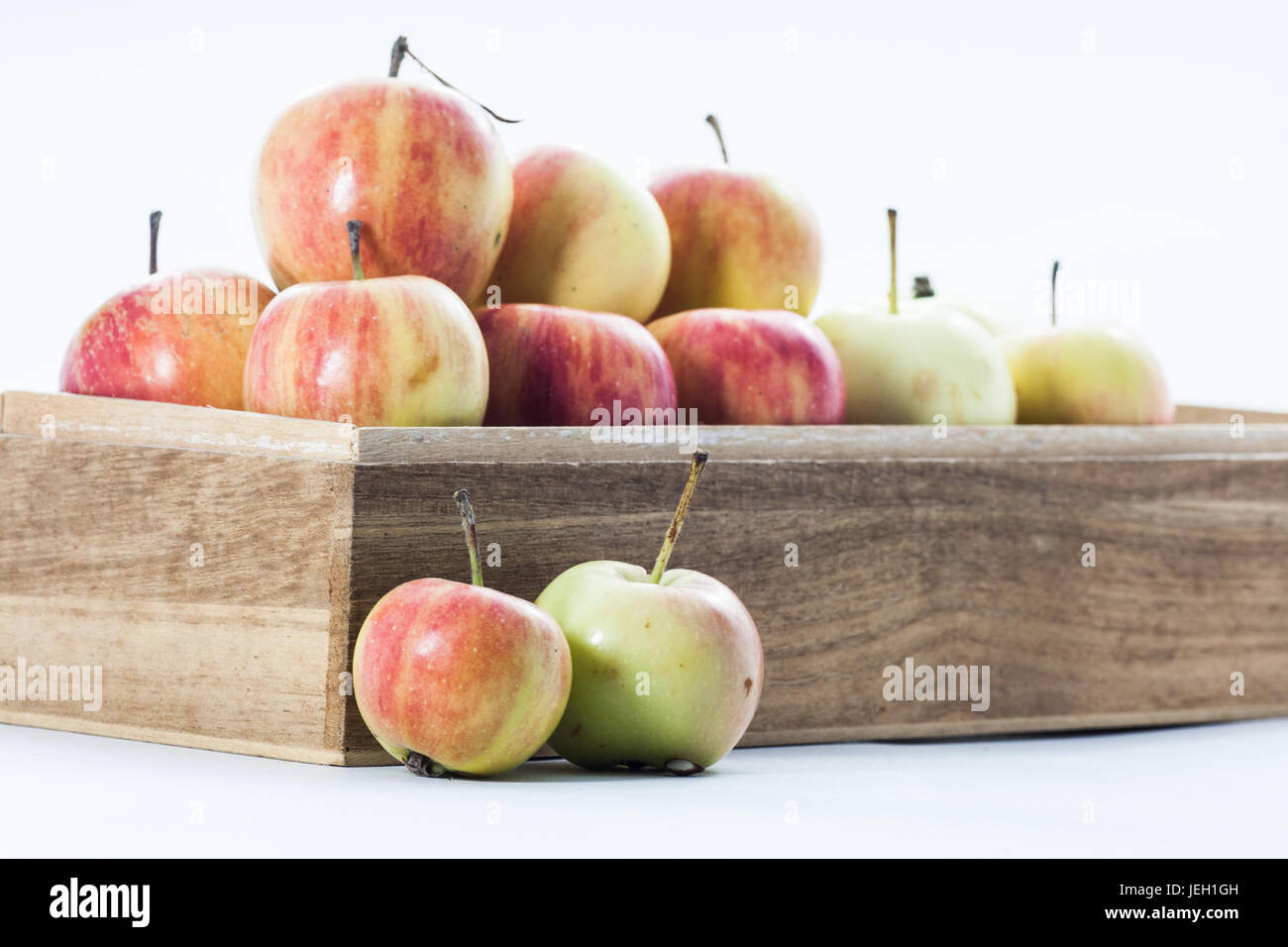 Apple small ball On a white background Stock Photo - Alamy