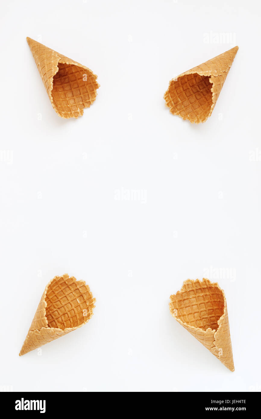 Several waffle cones lined in tower, smile, or even row, top view ...