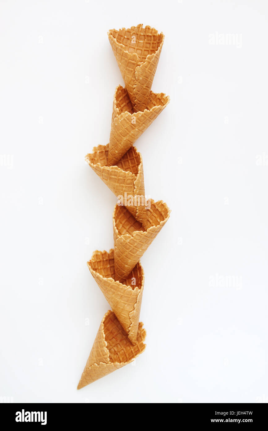 Several waffle cones lined in tower, smile, or even row, top view ...