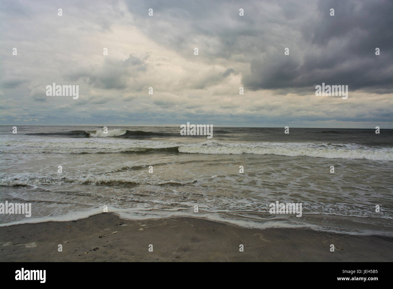 Overcast ocean waves landscape Stock Photo - Alamy