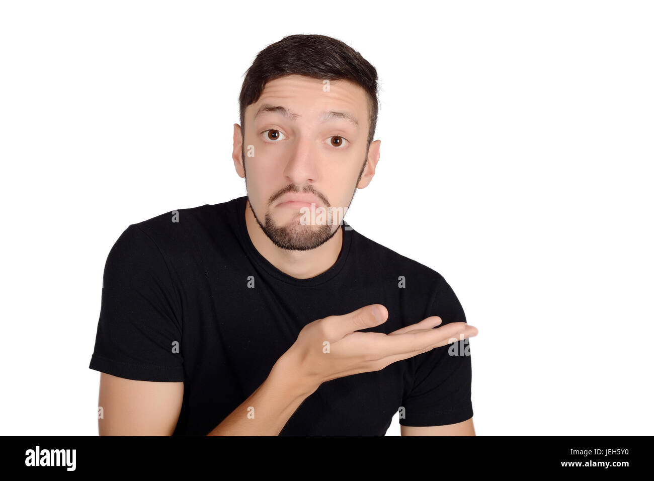 Portrait of a young man showing. Isolated white background Stock Photo ...
