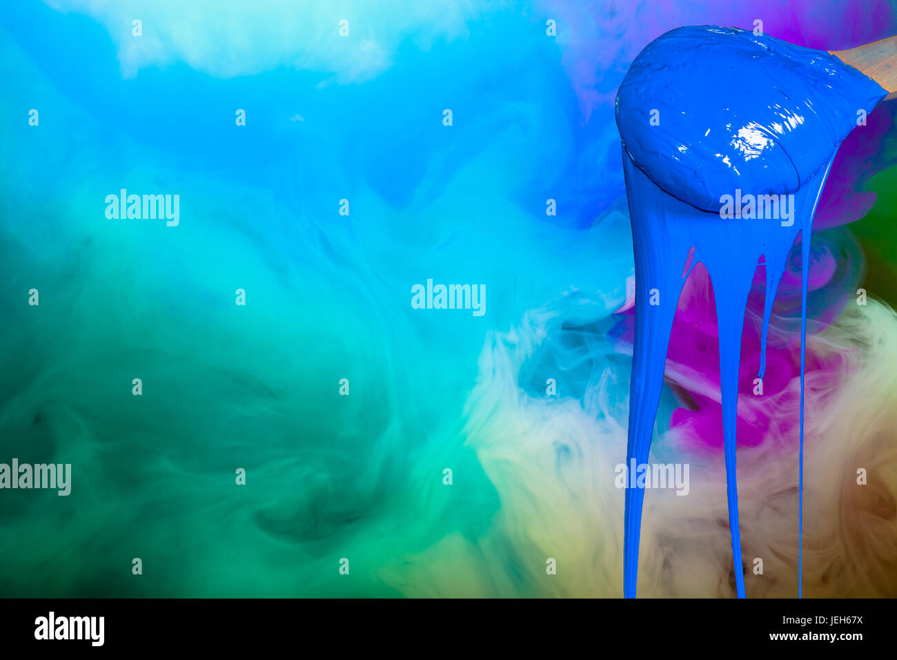 blue plastisol oil based ink in splash watercolor base background ...