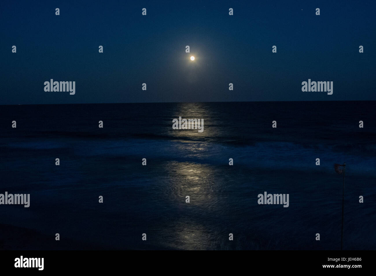 Moonrise over the Atlantic Stock Photo - Alamy