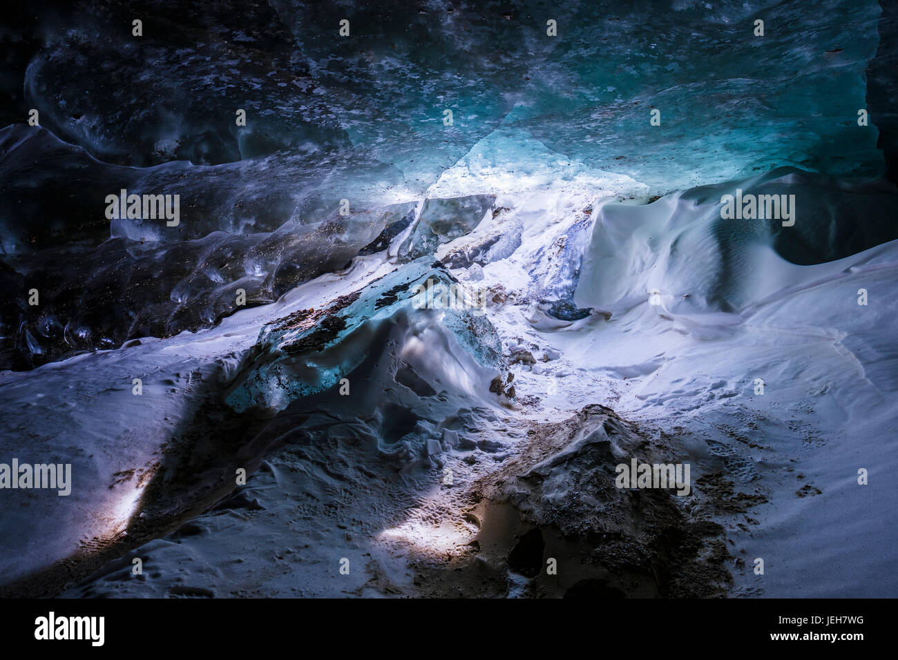 Strange light shines on the floor of a cave beneath the ice of Castner ...