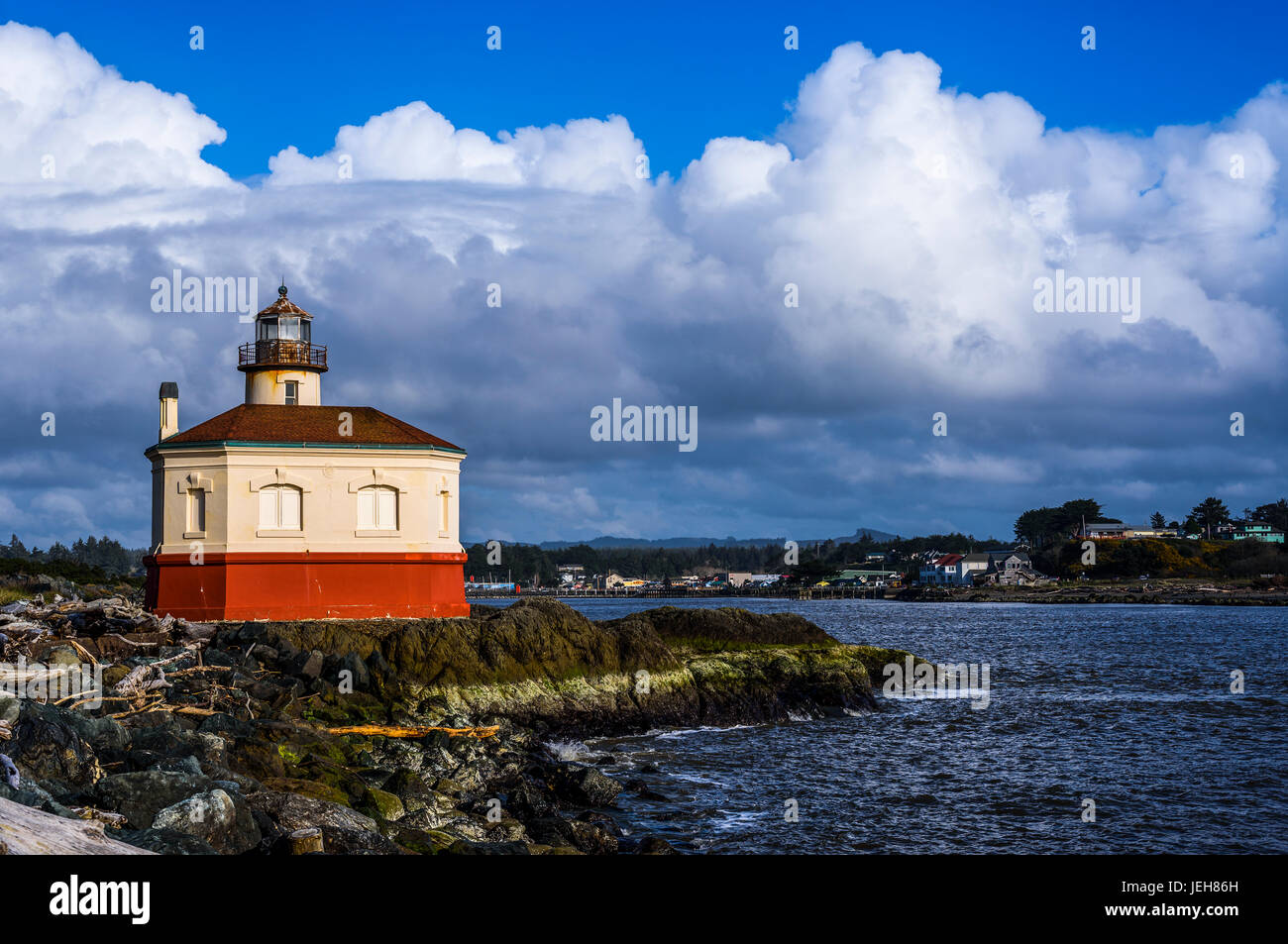 Clouds hover behind the Coquille River Lighthouse on the Oregon Coast ...