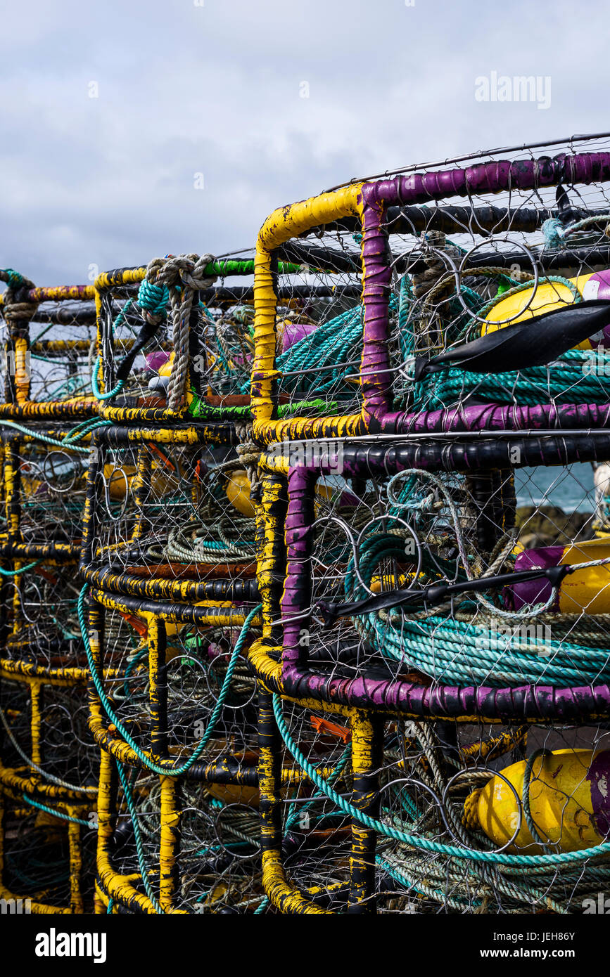 Dungeness Crab pots are stacked on the pier; Port Orford, Oregon ...