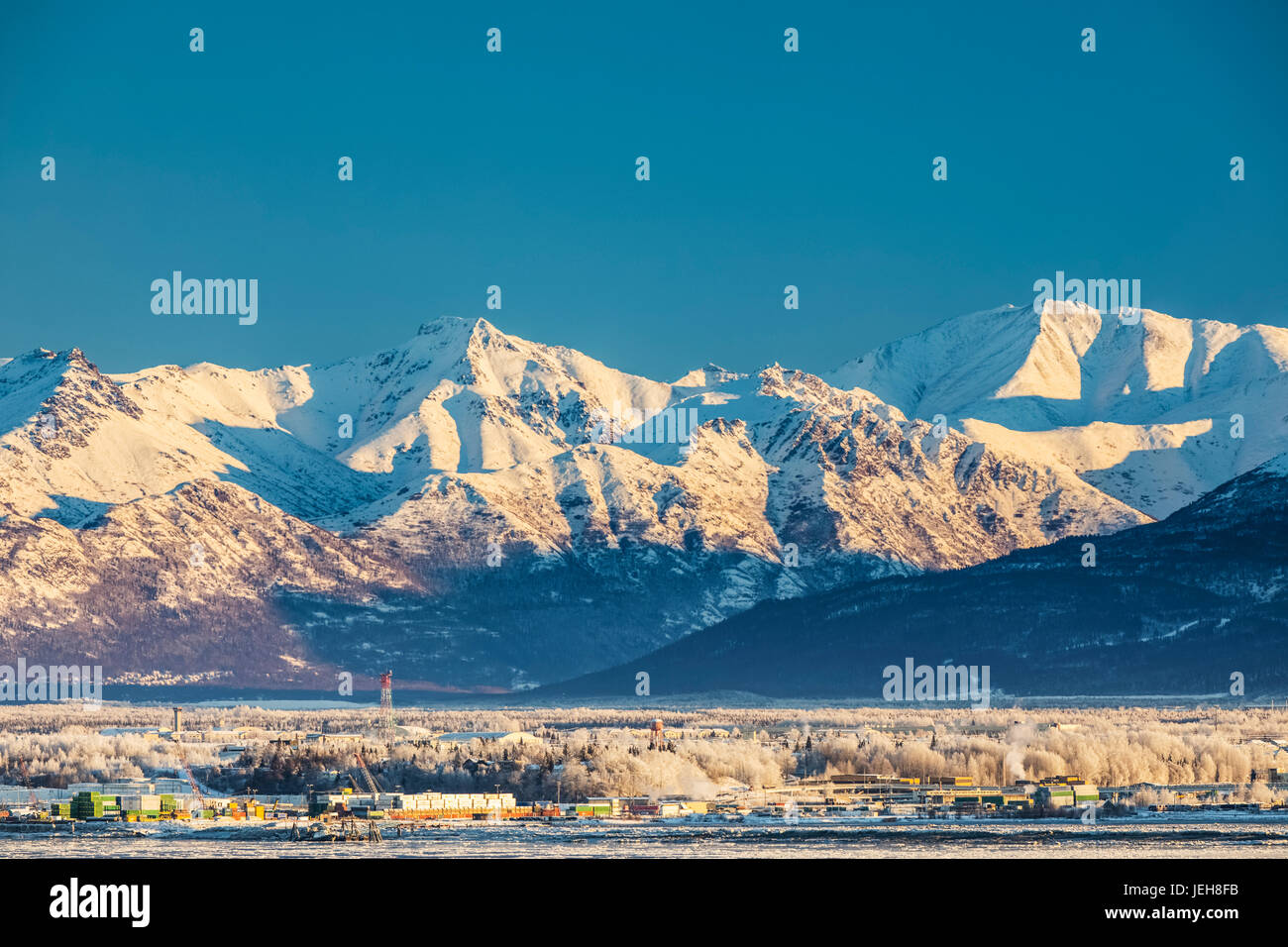 View Of Downtown Anchorage In Winter And The Snow-Capped Chugach ...
