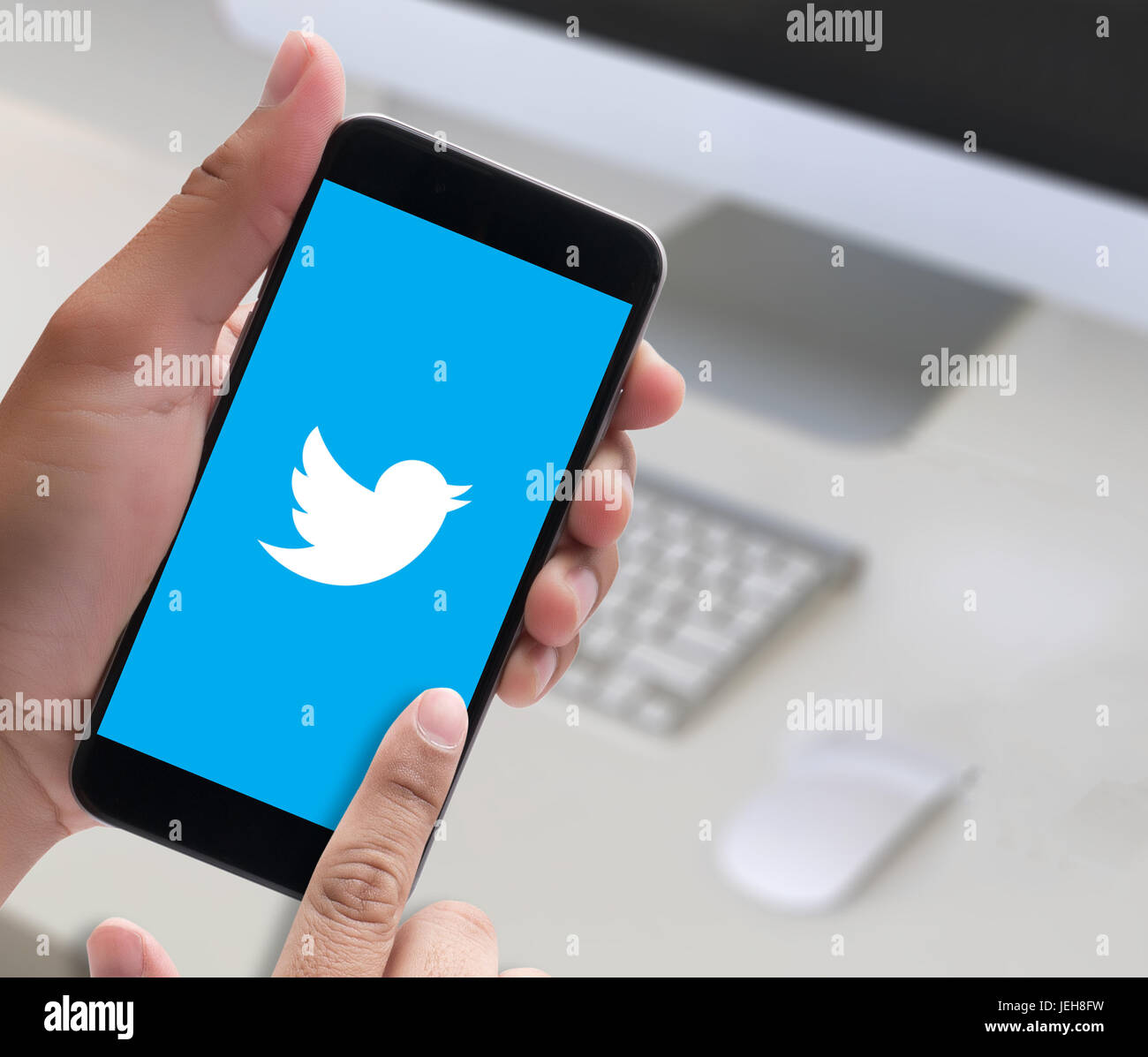 Twitter logo on screen office hi-res stock photography and images - Alamy