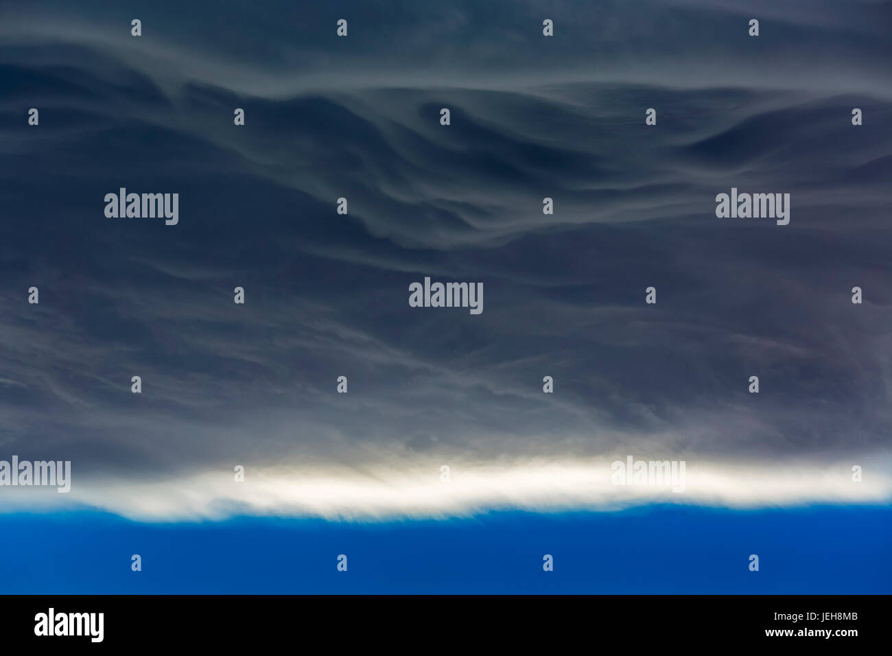 Close-up of chinook cloud formation with blue sky ending the clouds ...