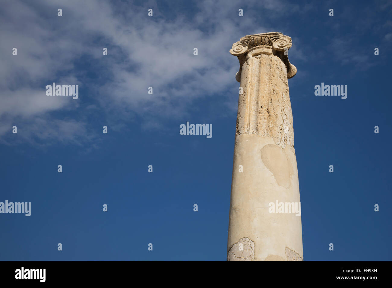 Low angle view of a column against a blue sky with cloud, Beit Shearim ...