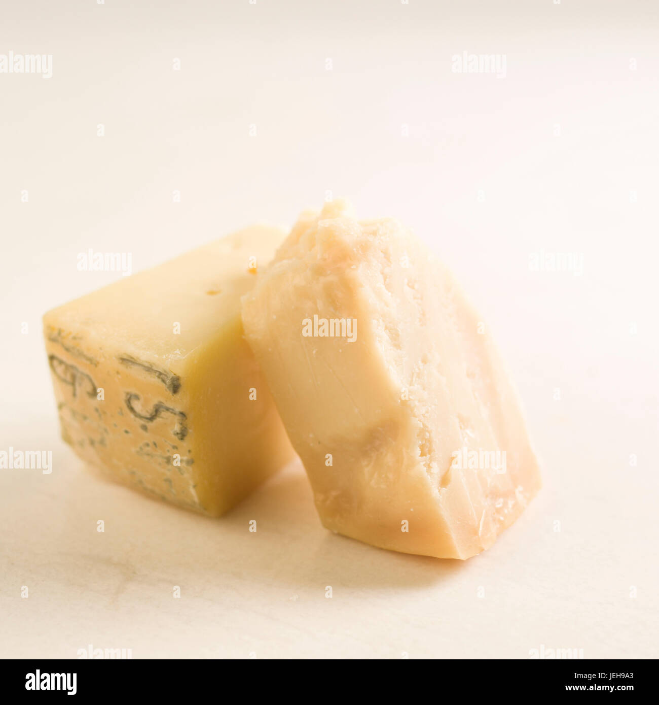 Parmesan cheese on a white background Stock Photo - Alamy