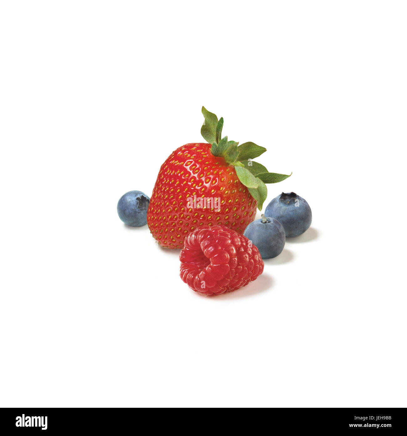 Strawberry, raspberry and blueberries on a white background Stock Photo ...