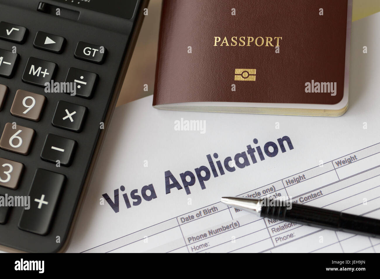 Visa application form to travel Immigration a document Stock Photo - Alamy