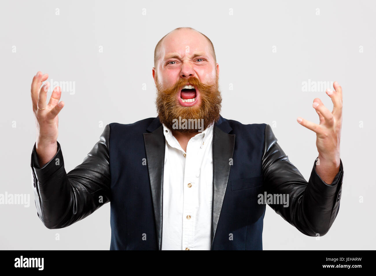 Screaming man with ginger beard Stock Photo - Alamy