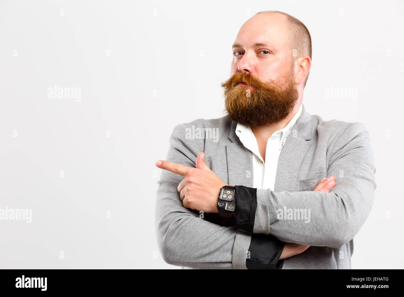 Man points finger to side Stock Photo - Alamy