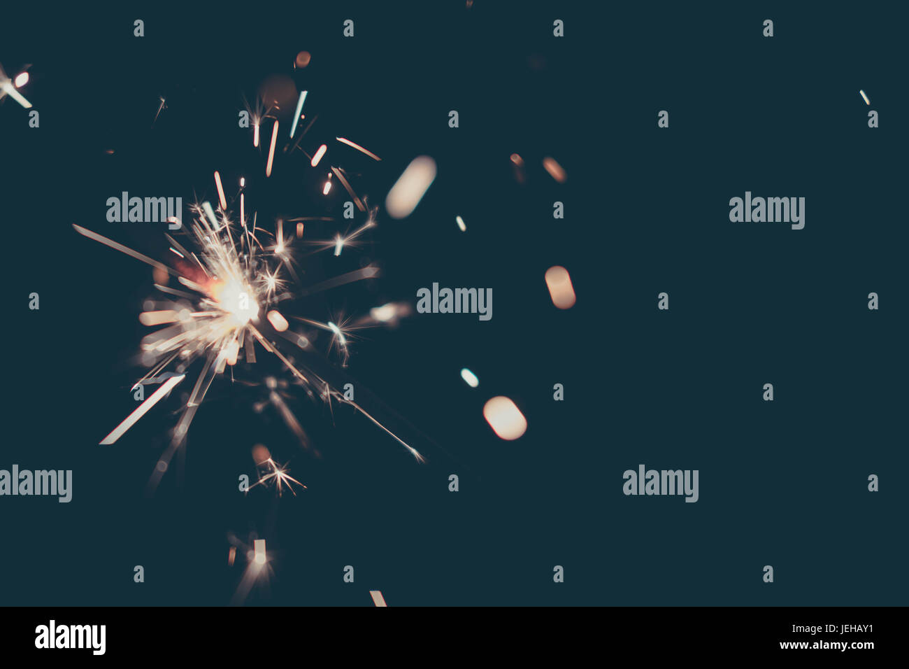 Burning Sparklers at Night Stock Photo - Alamy
