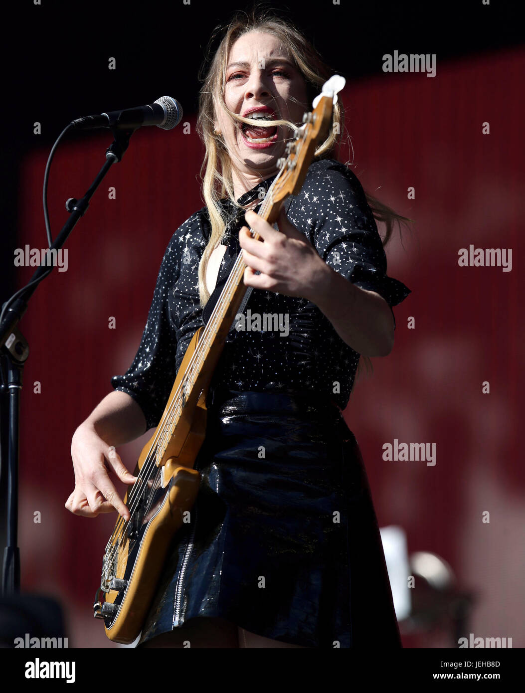 Este Haim of Haim performing on the Other Stage at Glastonbury Festival ...
