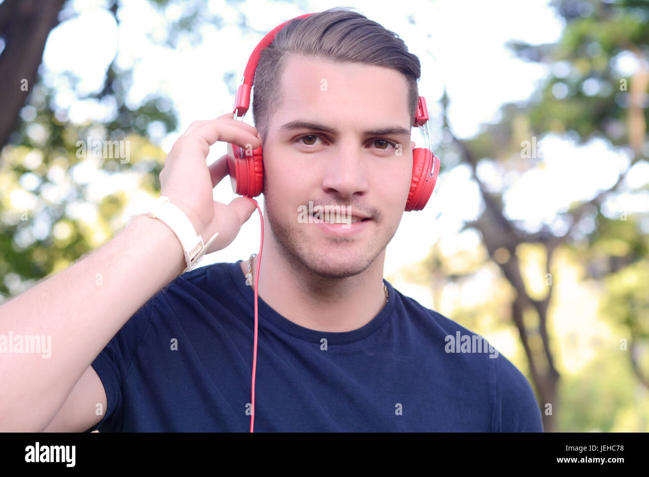 Beautiful young caucasian man headphones hi-res stock photography and images - Alamy