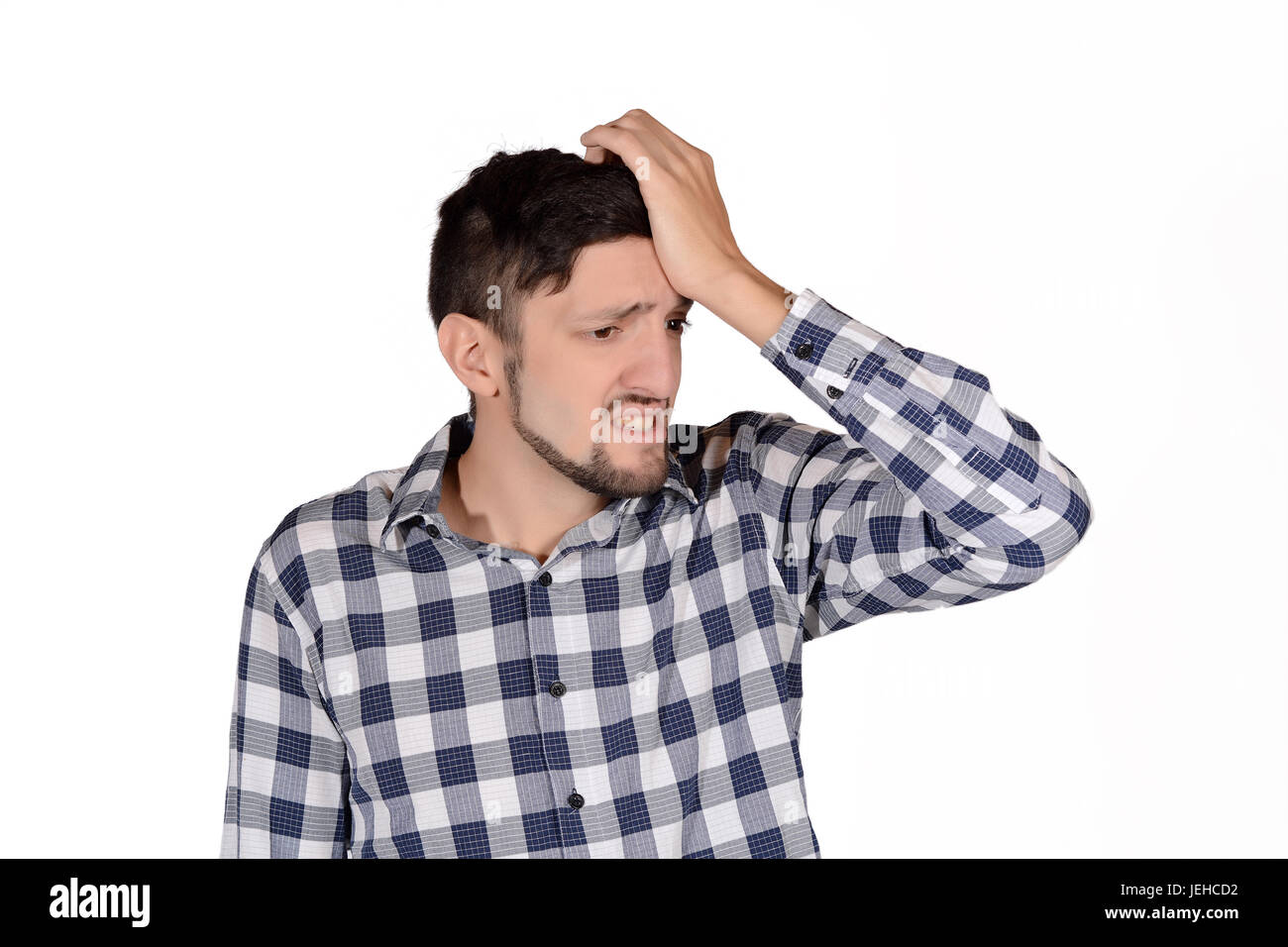 Portrait of a young man worried. Isolated white background Stock Photo ...