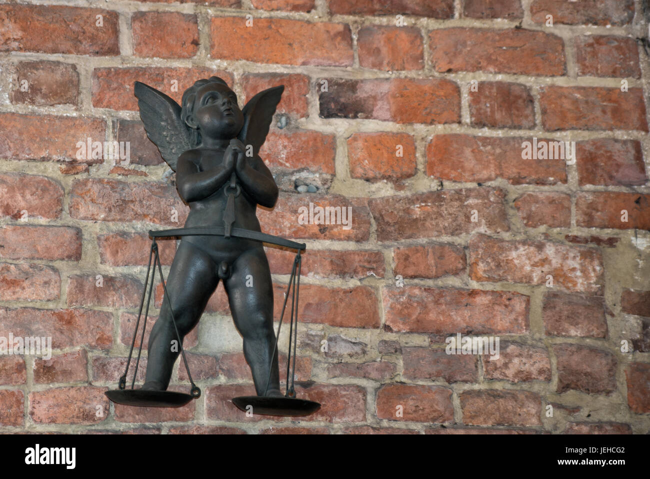 angel with scales of justice symbol in the old in Krakow Stock Photo ...