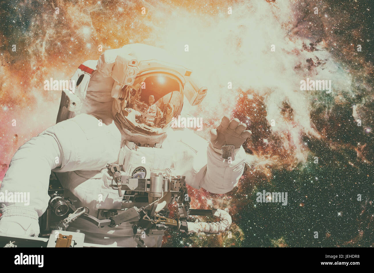 Astronaut in outer space against the backdrop of the outer space ...