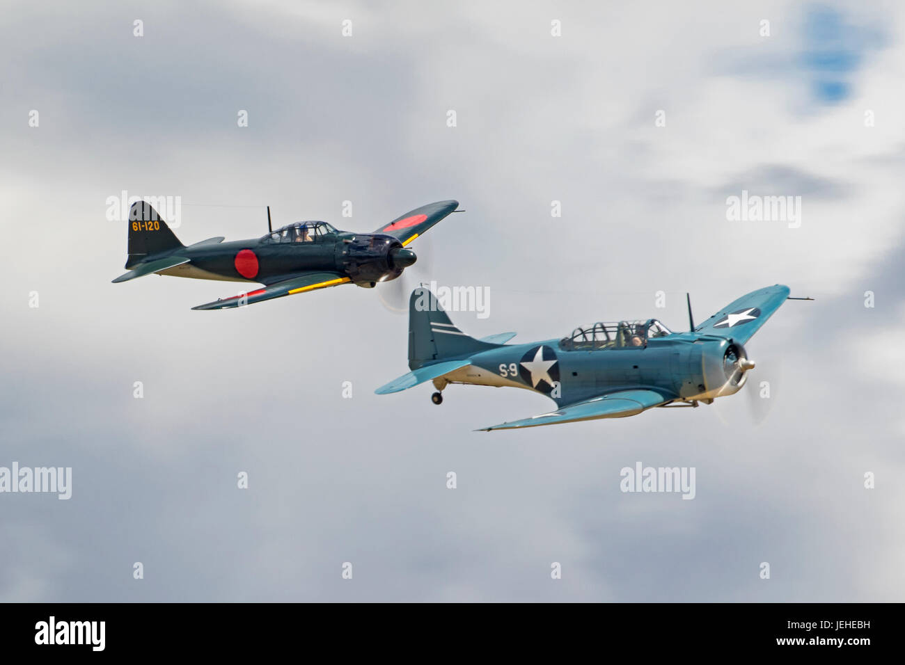 Airplanes WWII vintage Zero and Dauntless fighters flying together ...