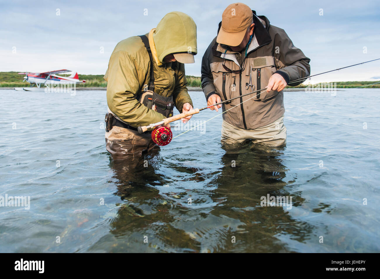 Fly fisherman and guide prepare for the next cast in Ugashik River ...