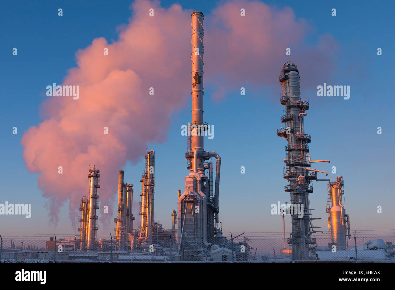 The Sun Rises On The Flint Hills Refinery And An Exhaust Cloud From A ...