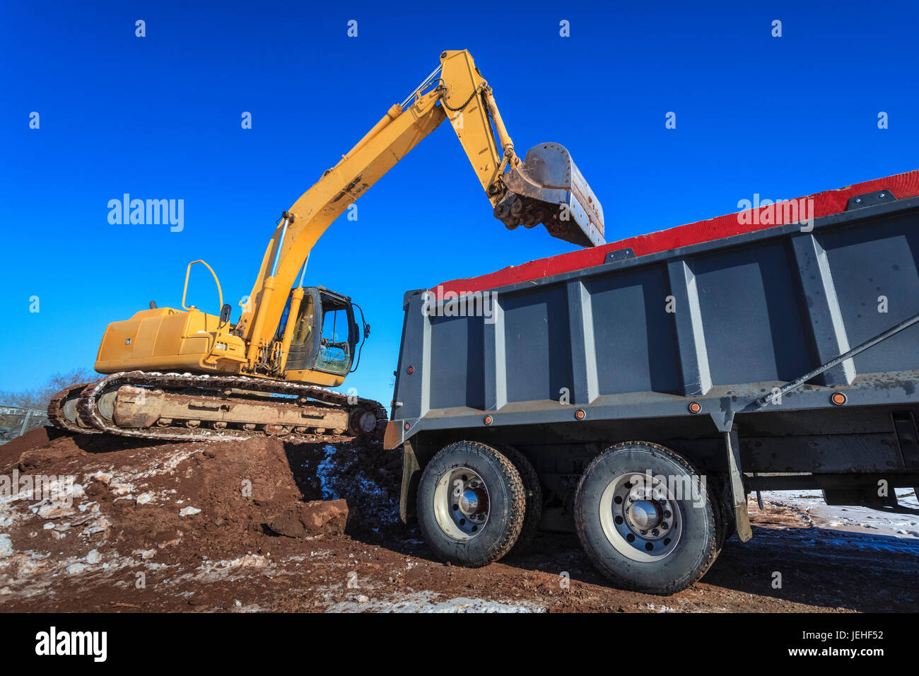 Excavator loads soil dump hi-res stock photography and images - Alamy