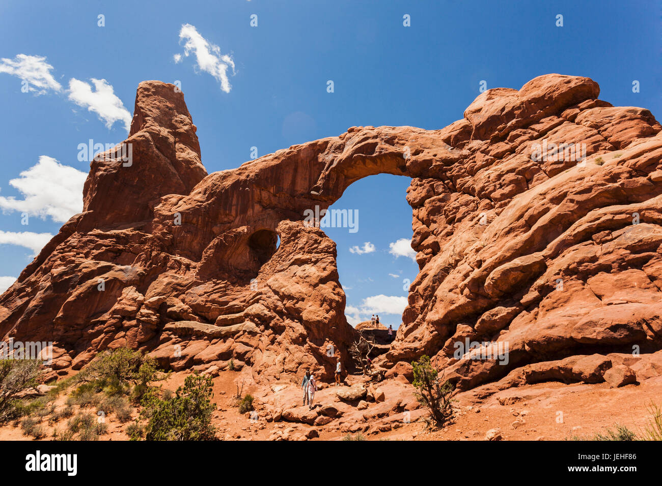 A natural stone arch in Arches National Park; Utah, United States of ...