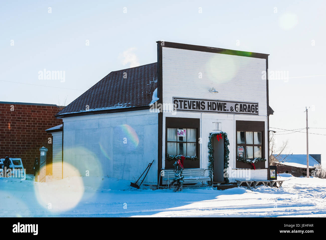 A shop and garage in the Alberta prairies in winter; Orion, Alberta ...