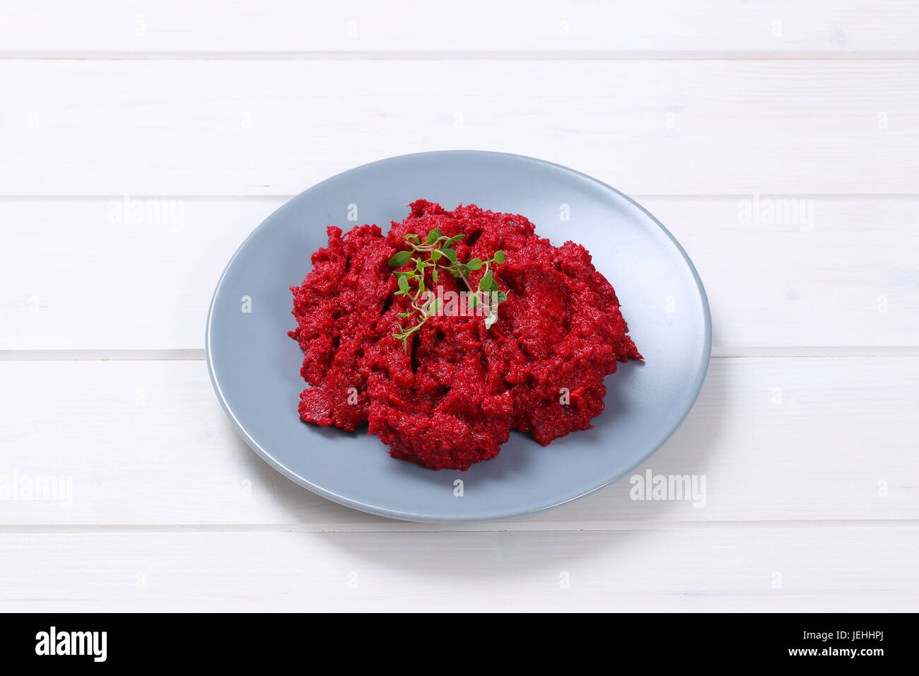 plate of fresh beetroot puree on white wooden background Stock Photo ...