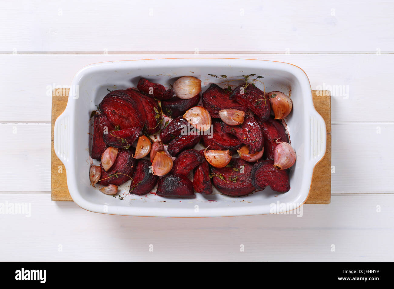 freshly baked beetroot with garlic in baking dish Stock Photo - Alamy