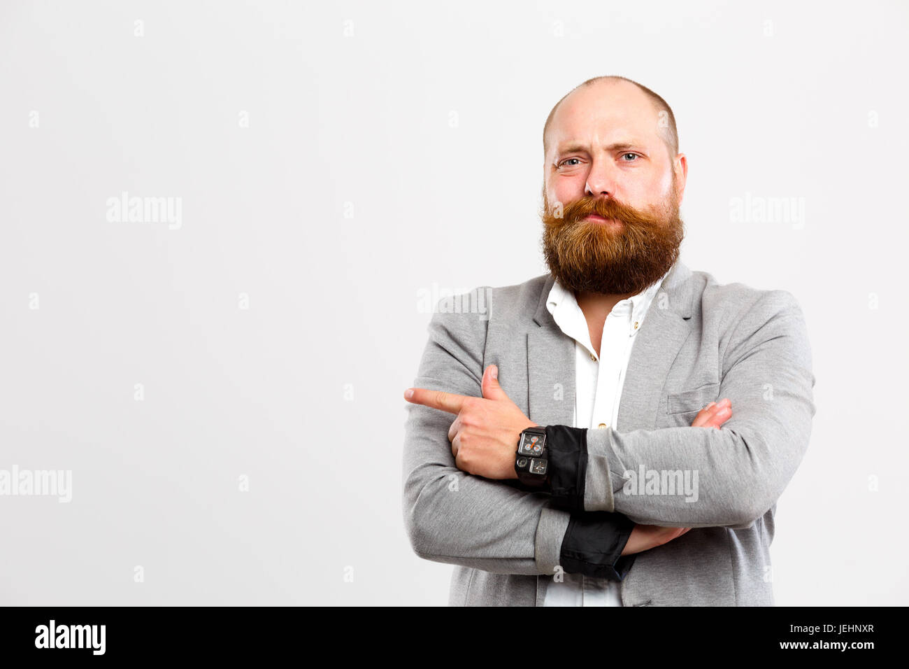 Man shows finger to side Stock Photo - Alamy