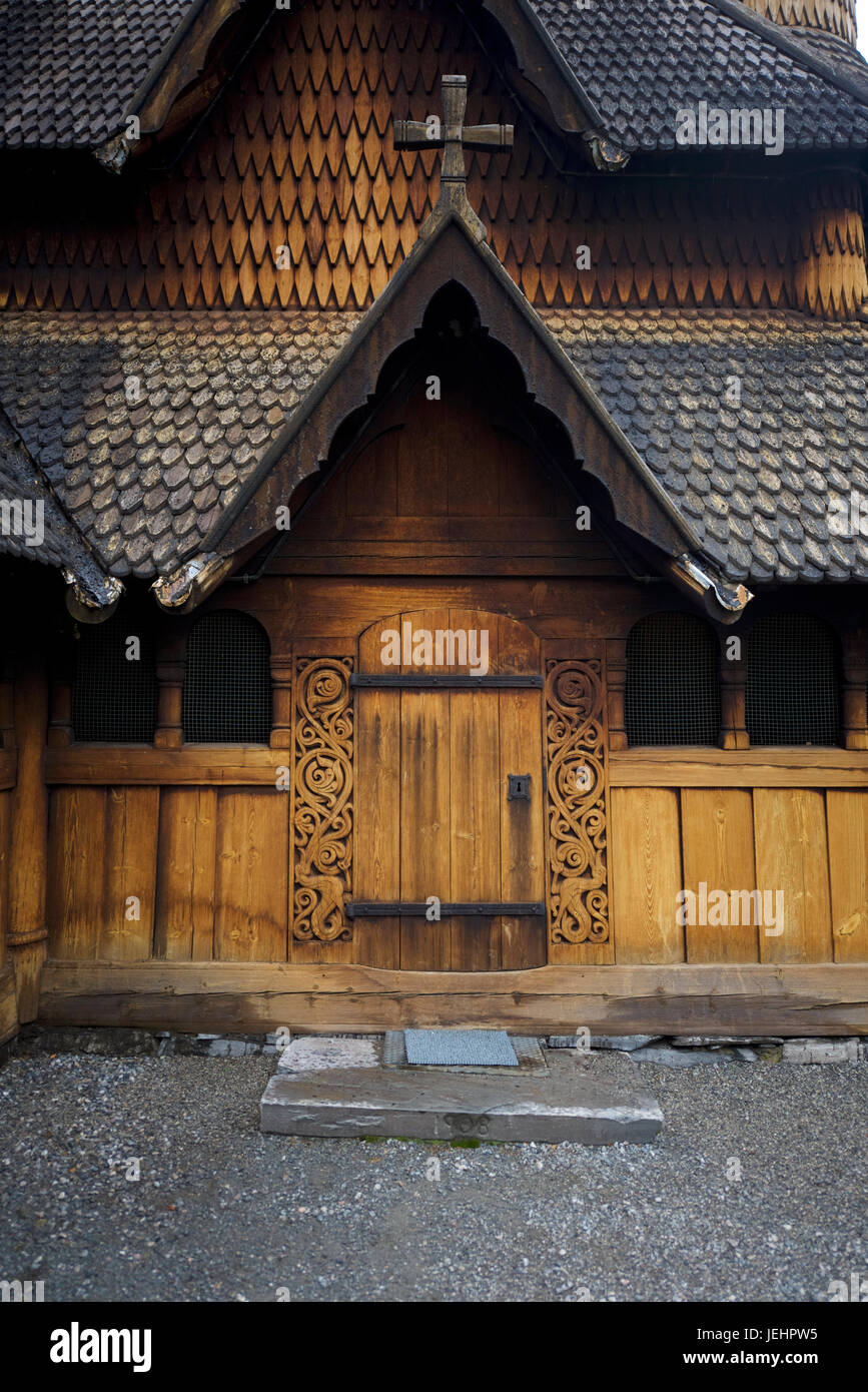 Side entrance to the Heddal Stavkirke, in rural Norway. It is the ...