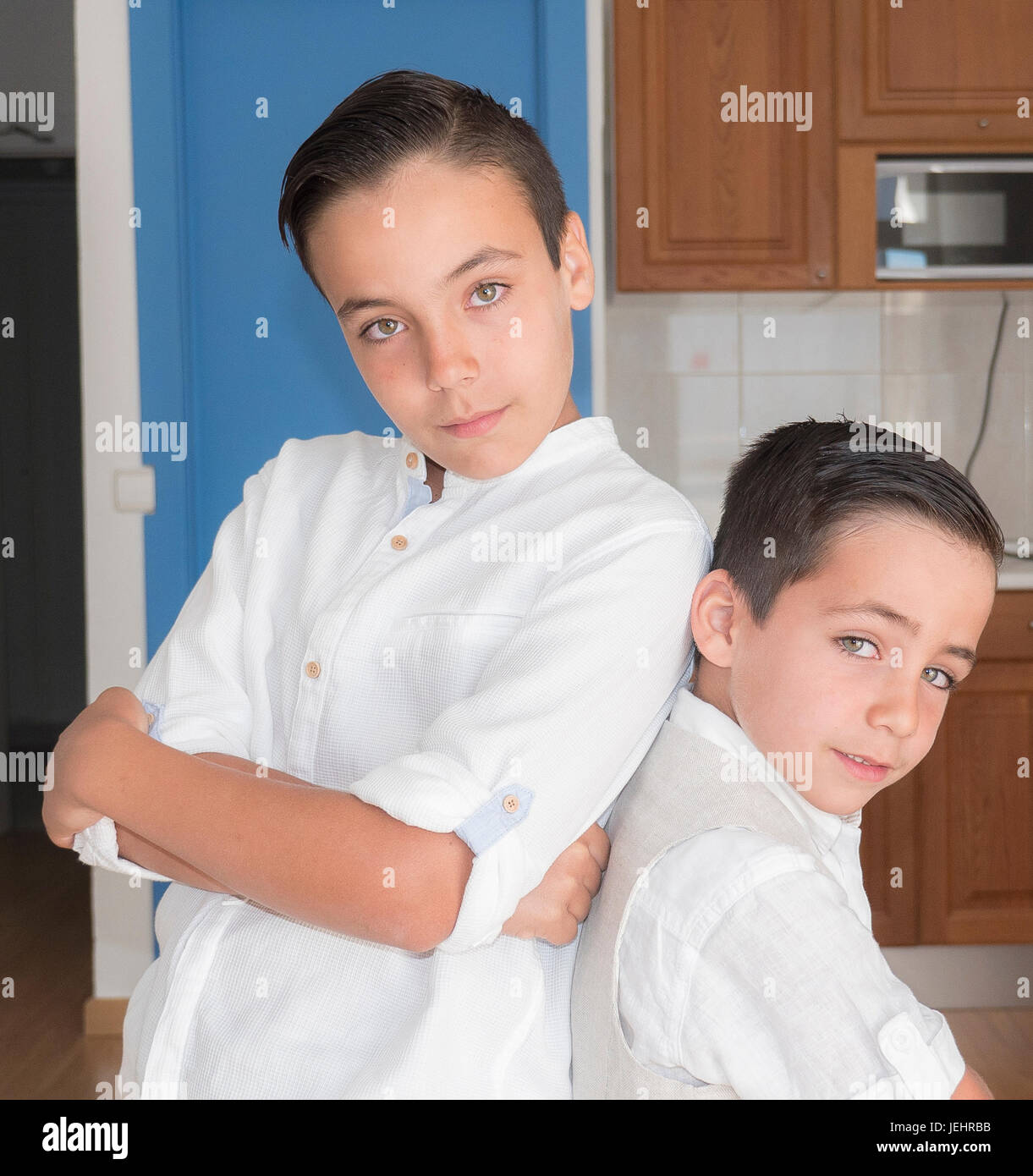 two handsome green eyes boys Stock Photo - Alamy