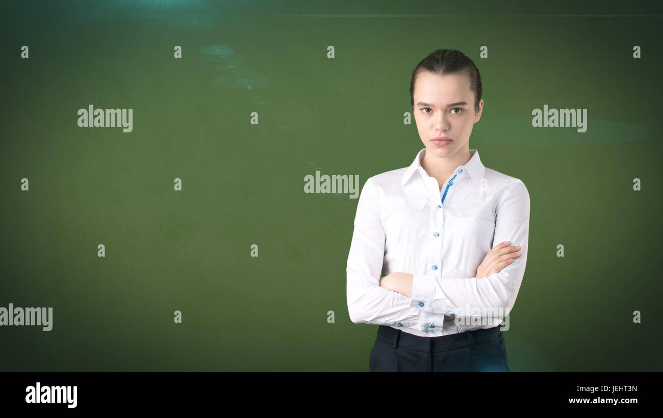 Beautiful serious businesswoman portrait, isolated studio background ...