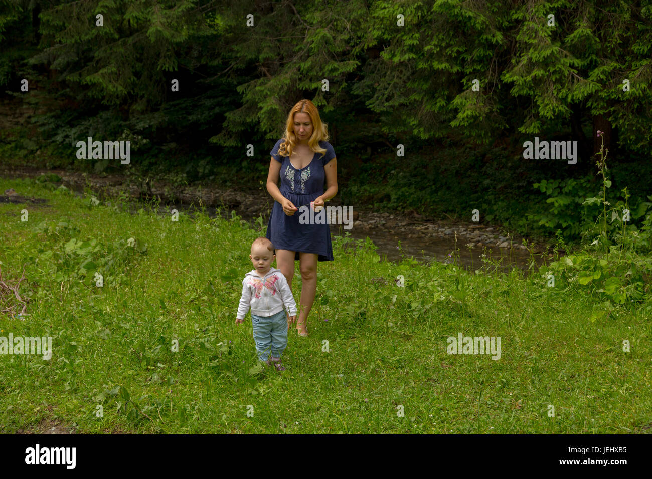 Toddler discovering nature Stock Photo - Alamy