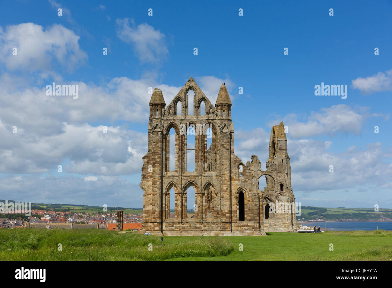 Whitby Abbey Yorkshire uk landmark on hillside over tourist town and ...