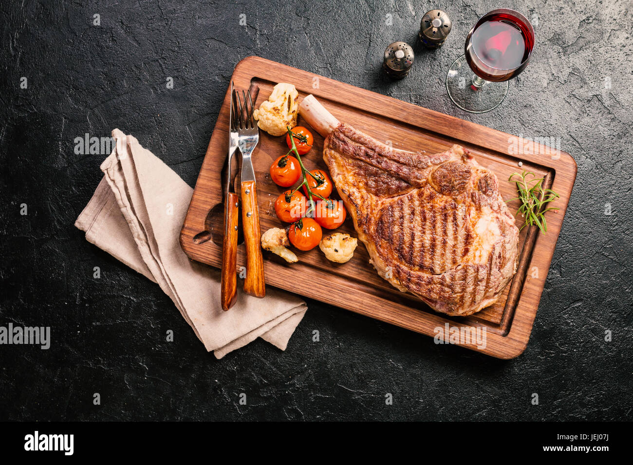 grilled tomahawk beef steak Stock Photo - Alamy