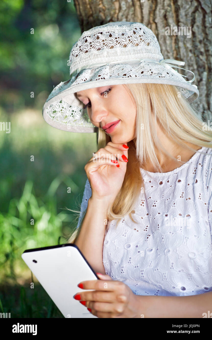 Girl with iPad Stock Photo - Alamy