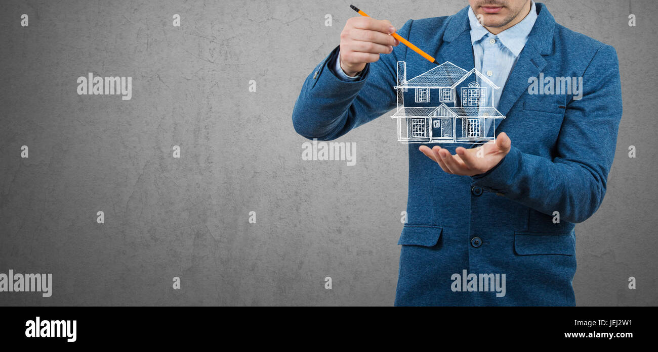 Creative businessman holding a pencil in his hand try to draw an ...