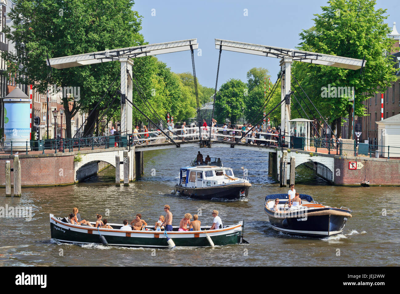 AMSTERDAM-AUG. 19. Boats in canal with drawbridge. It is known as ...