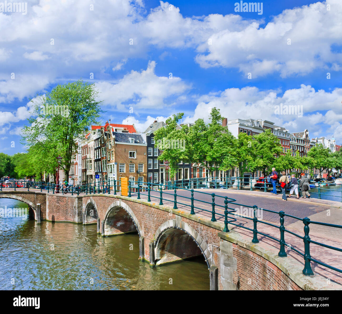 Amsterdam canal belt with ancient bridges and step gabled mansions ...