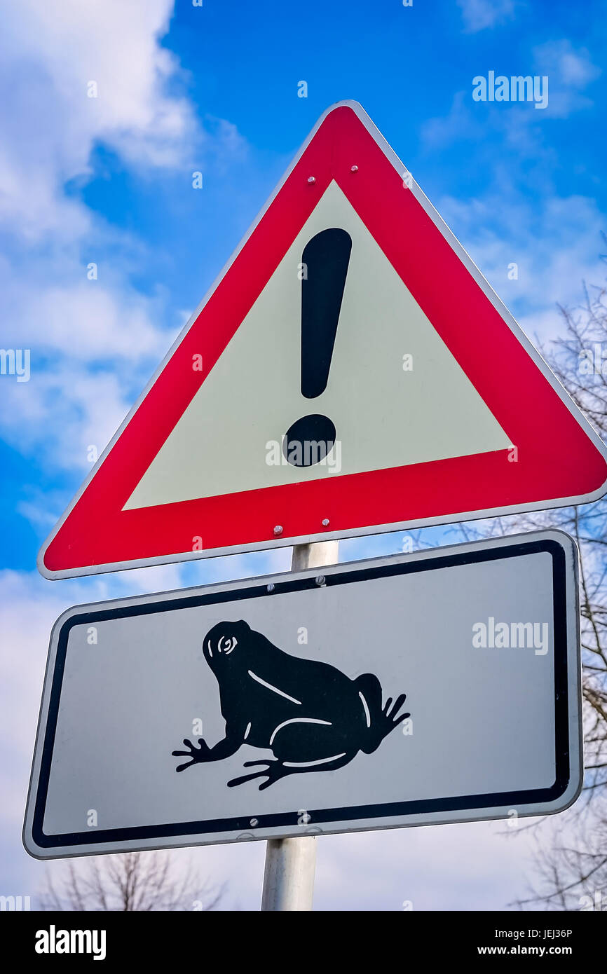 Sign indicating possibility of frogs on the road Stock Photo - Alamy