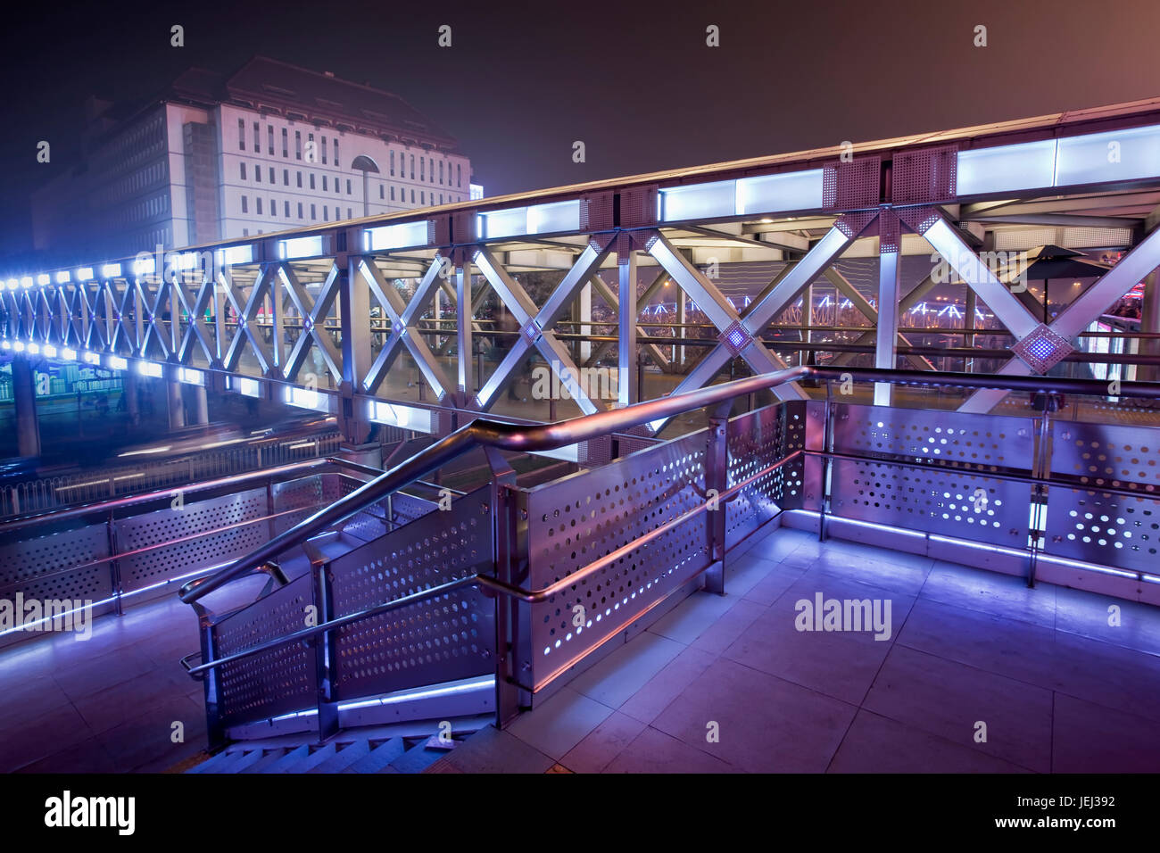 High-tech pedestrian bridge at Beijing Xidan shopping area Stock Photo ...