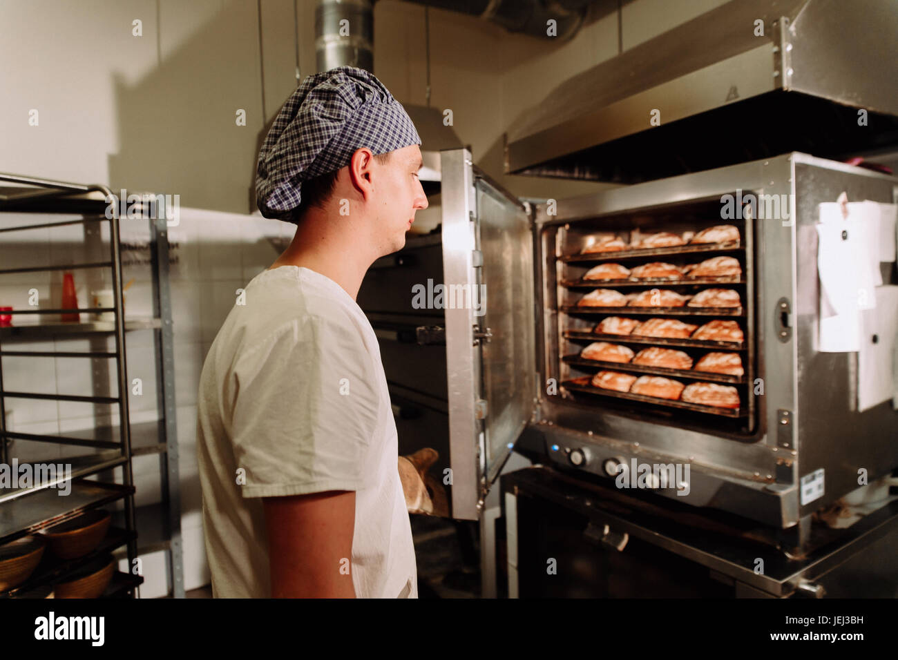 Food manufacturing uniform hi-res stock photography and images - Alamy