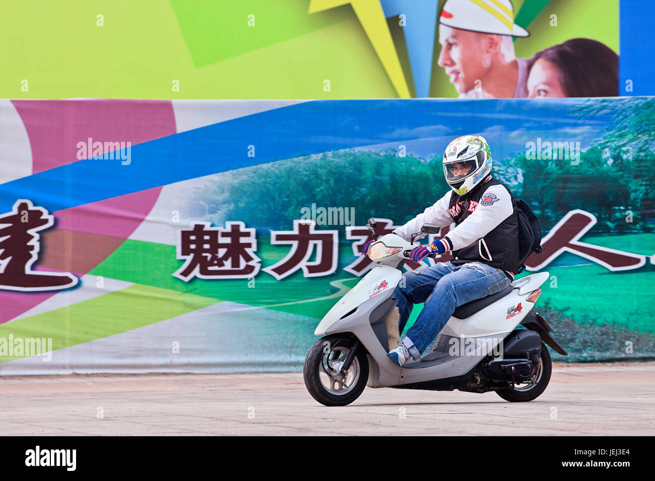 BEIJING – OCT. 12, 2011. Teenager on an engine scooter on Oct. 12, 2011 ...