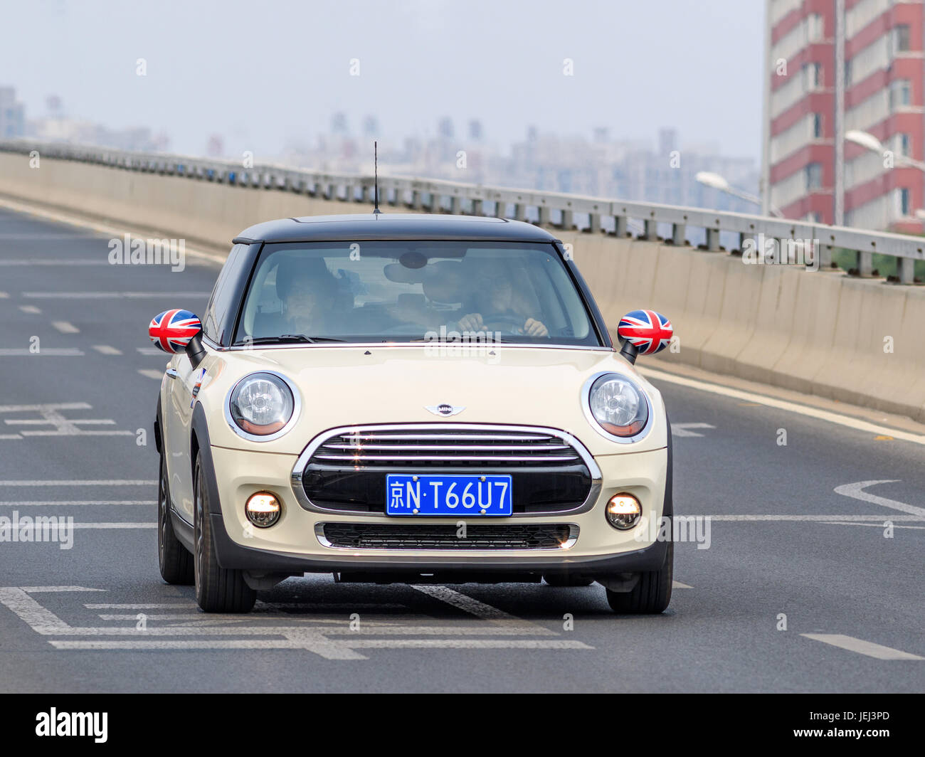 BEIJING-JUNE 5, 2016. Mini Cooper on the street. BMW and Mini are ...